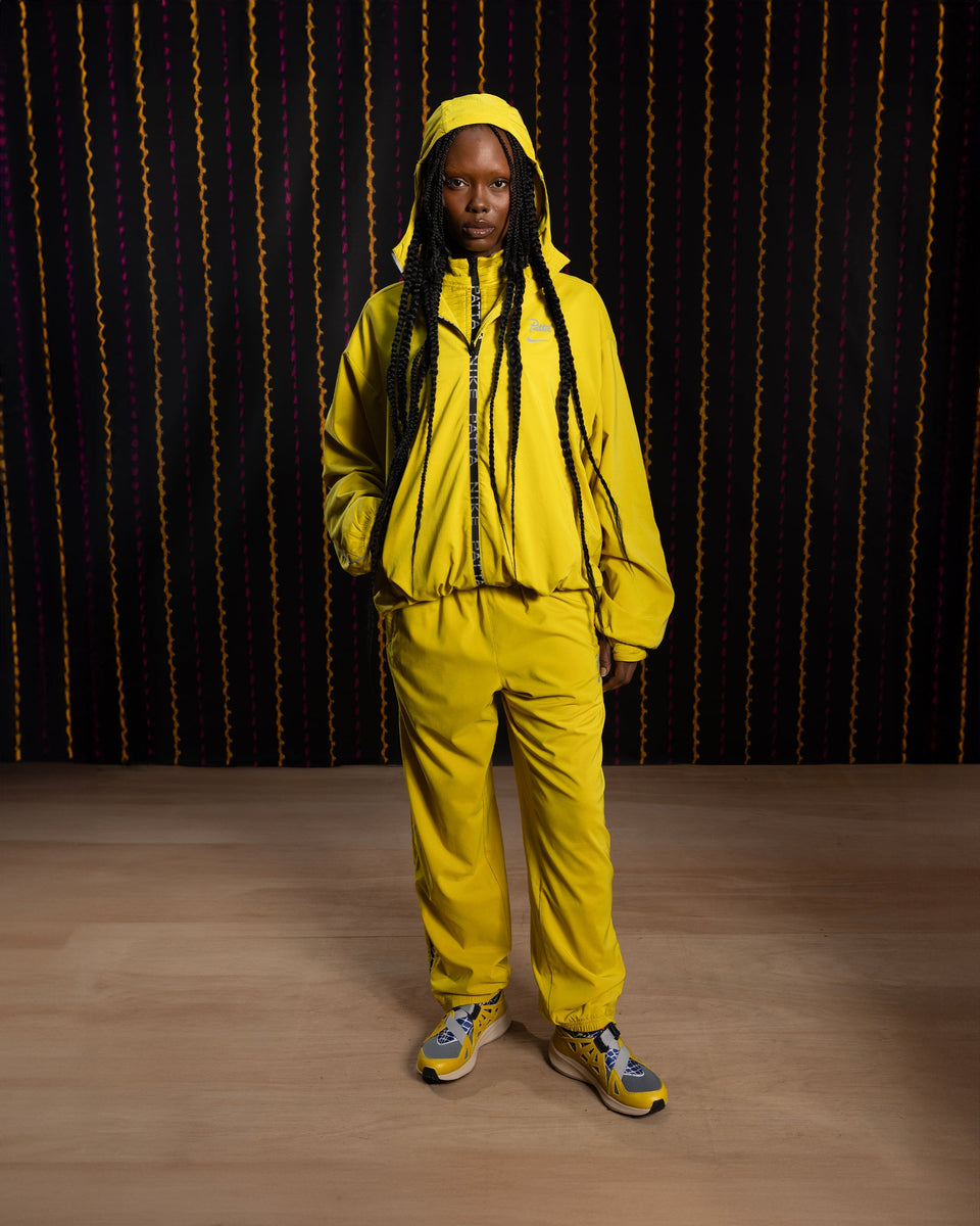 Nike x Patta Running Team Hooded Track Jacket (Saffron Quartz) – Patta UK